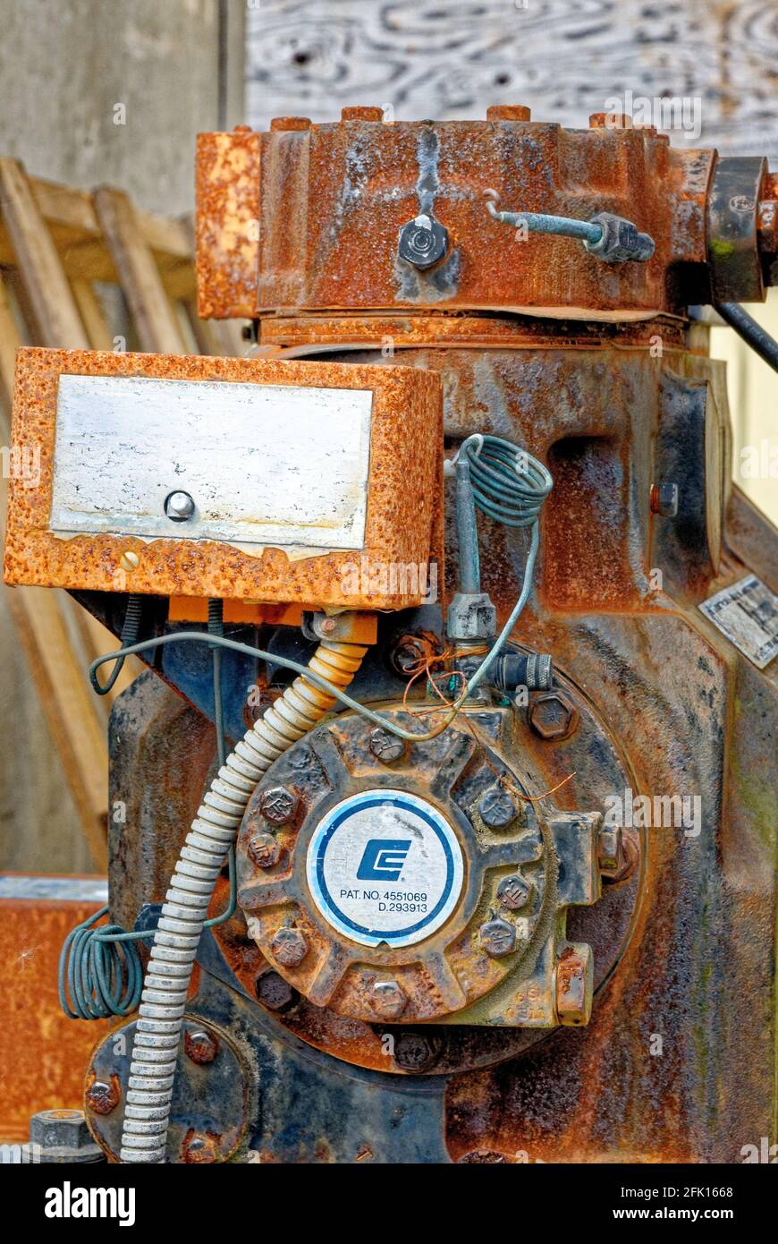 Old rusty discarded air compressor powered by electric motor - Astoria ...