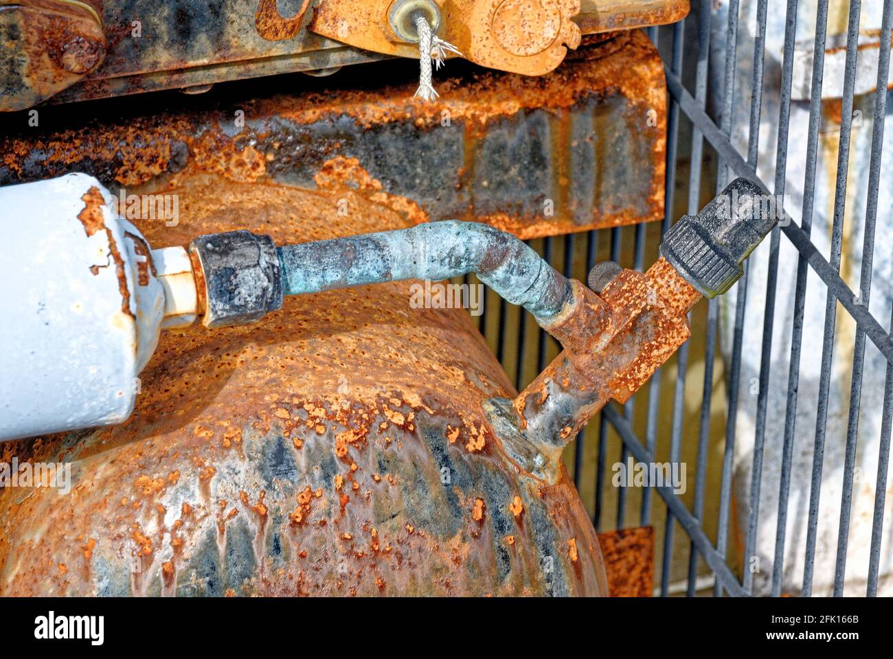 Old rusty discarded air compressor powered by electric motor - Astoria ...