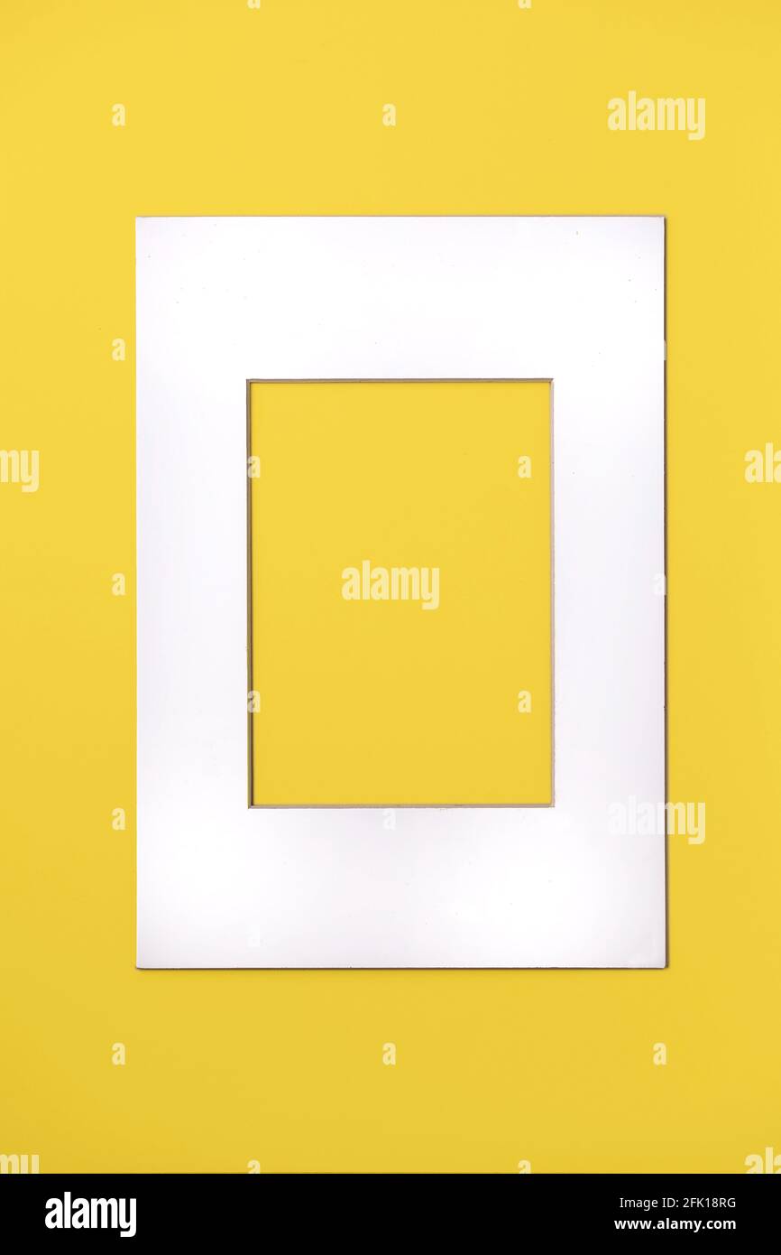 Sinple white paper frame over yellow background. Creative layout. Space ...