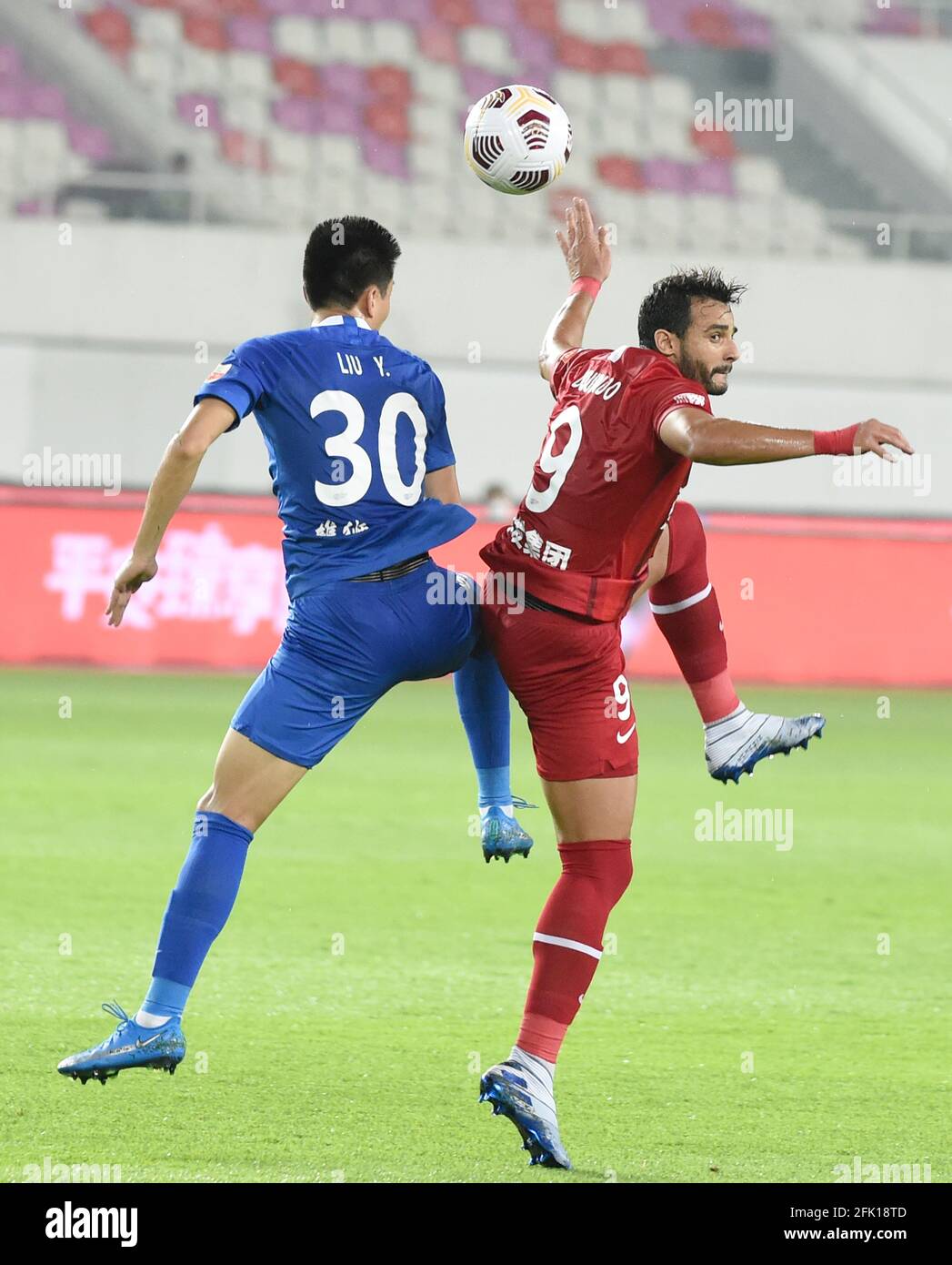 Guangzhou, China's Guangdong Province. 27th Apr, 2021. Liu Yang (L) of ...