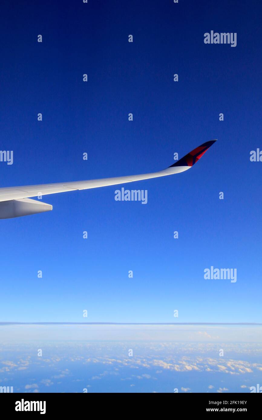 A view from an aircraft window over Pacific Ocean Stock Photo - Alamy