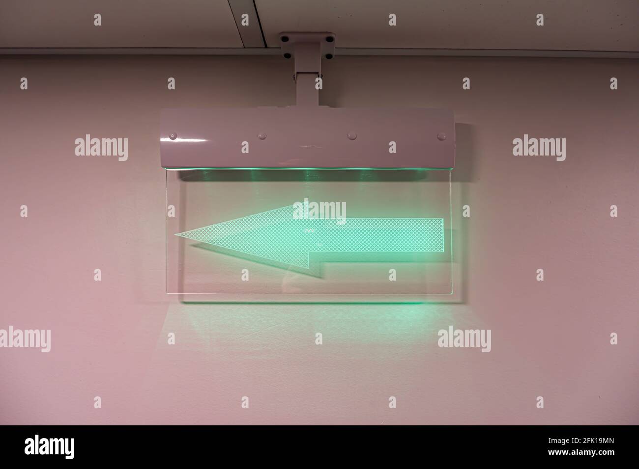 direction indicator in the form of a green illuminated arrow.move to ...