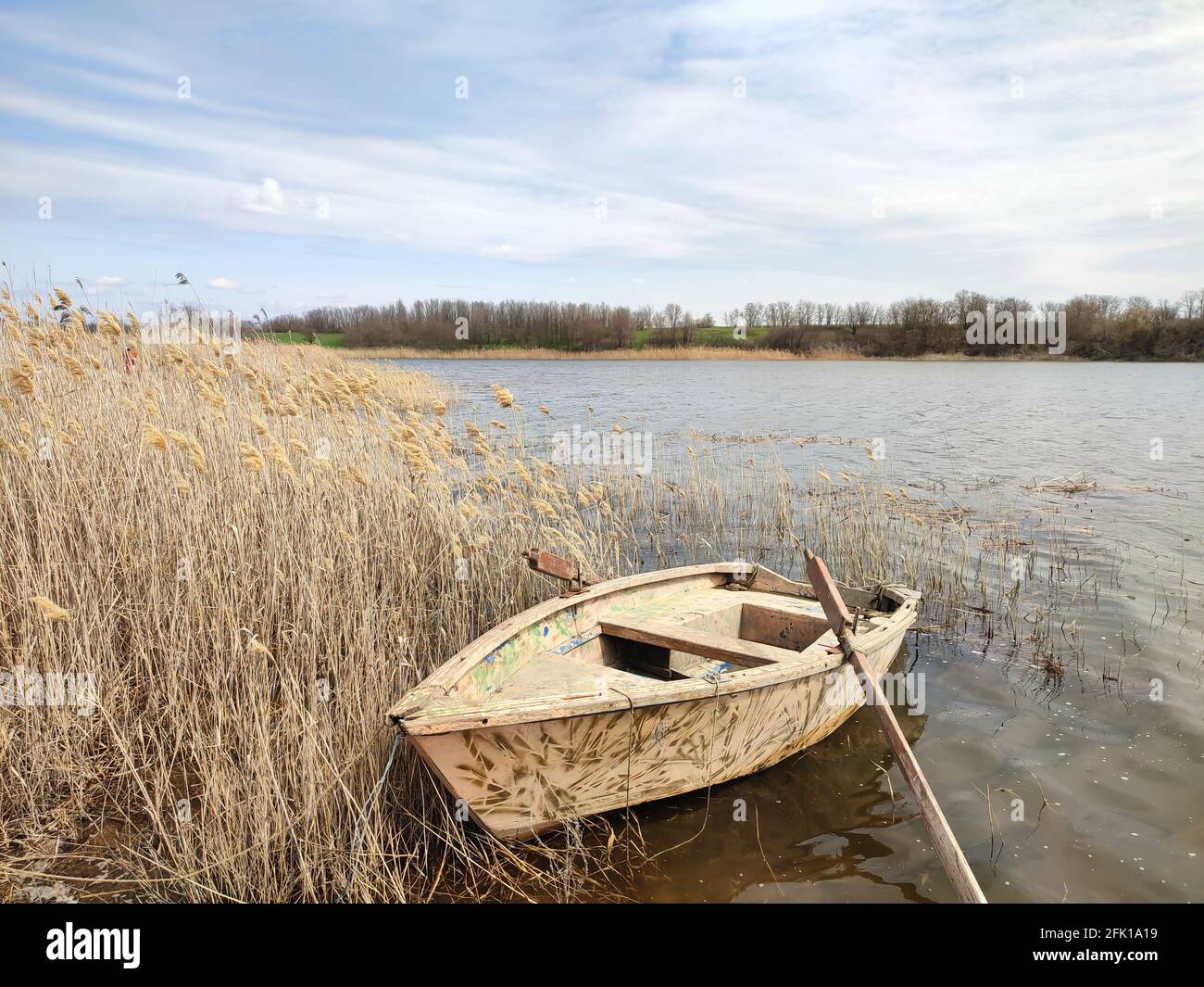 Empty wooden boat river bank hi-res stock photography and images - Alamy