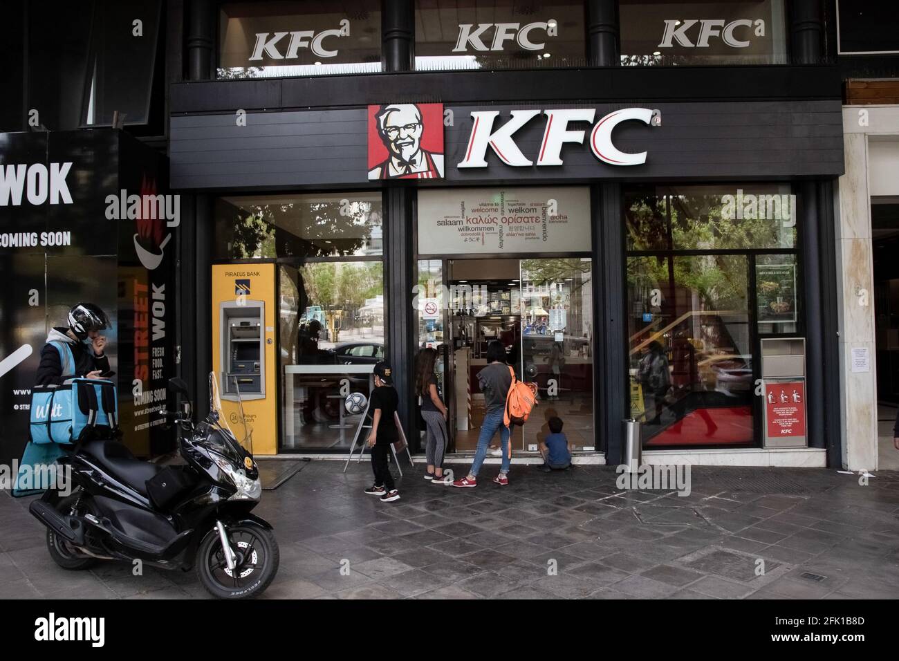 Athens, Greece. 27th Apr, 2021. People seen outside a KFC fast food ...