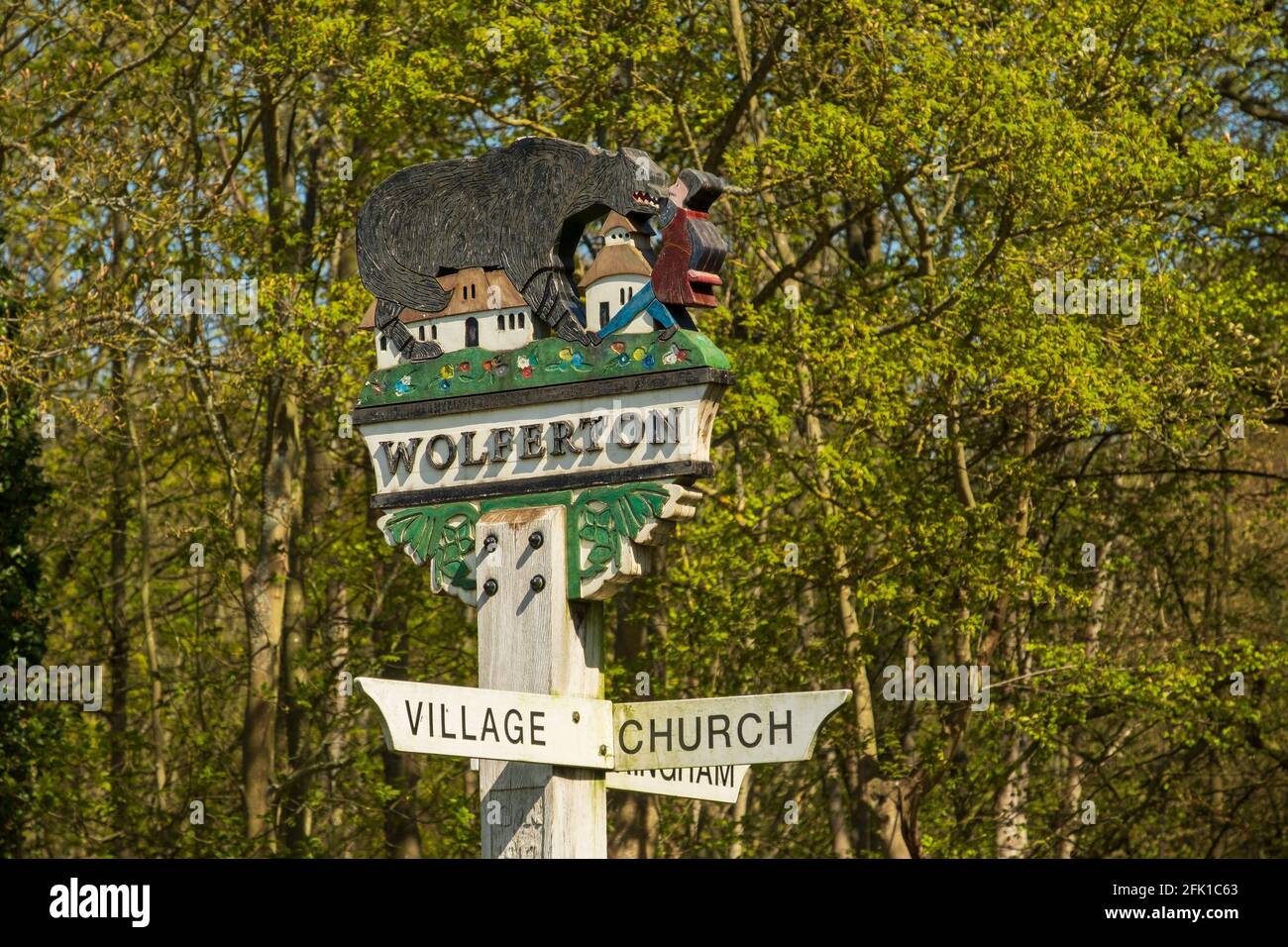 Wolferton village sign Stock Photo - Alamy