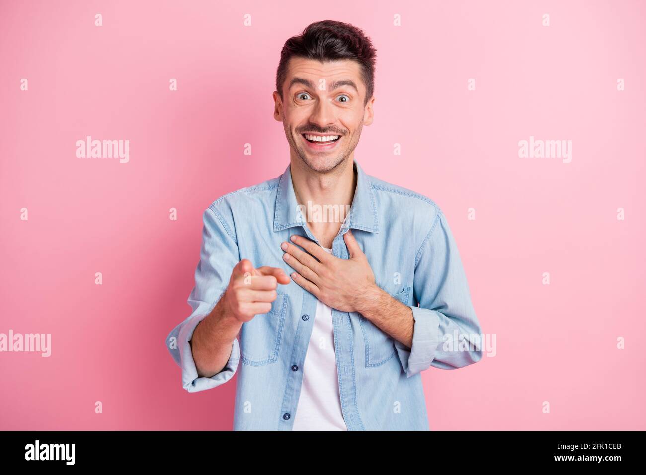 Portrait of nice cheerful guy pointing at you laughing mocking isolated ...