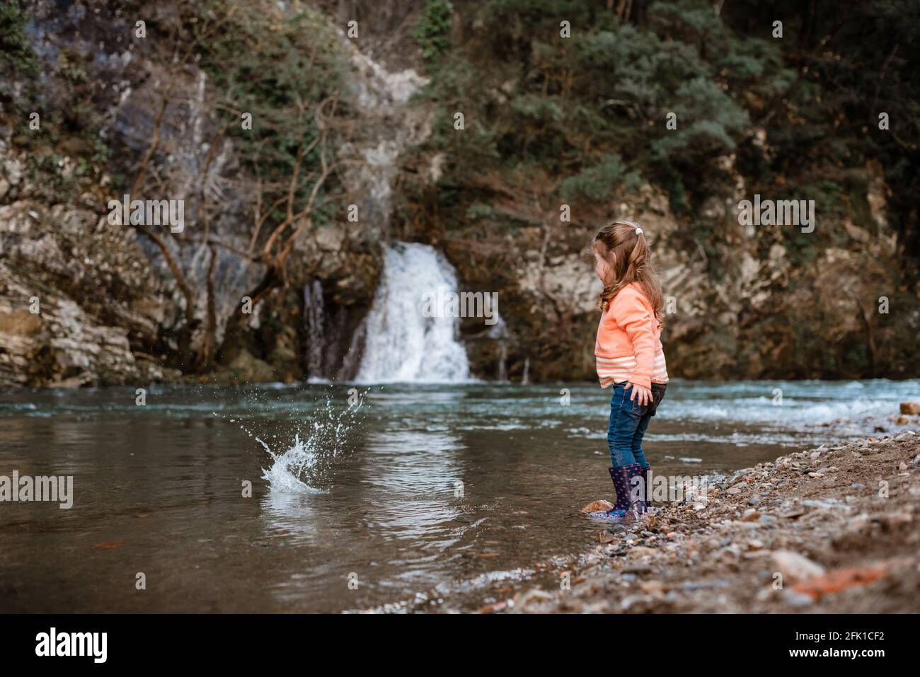 Girl in front waterfall hi-res stock photography and images - Alamy