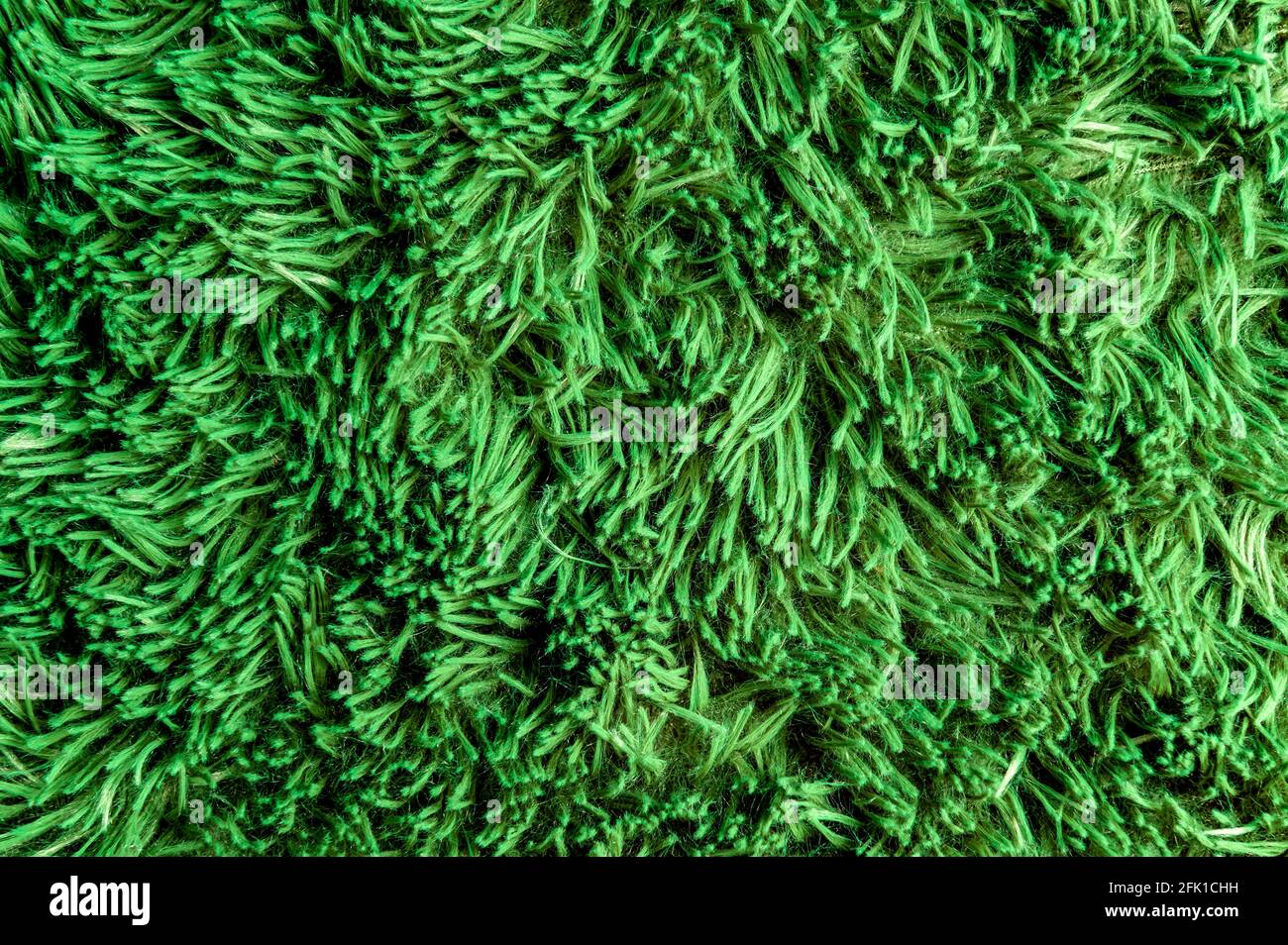 Artificial green grass texture. Background top-view close-up. Gress ...
