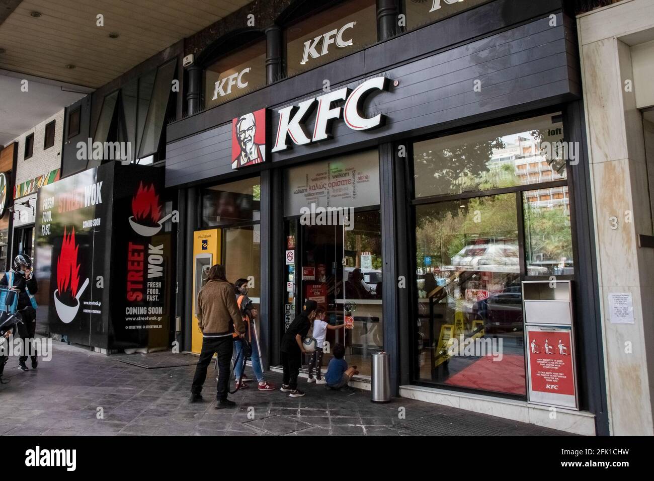 Athens, Greece. 27th Apr, 2021. People seen outside a KFC fast food ...