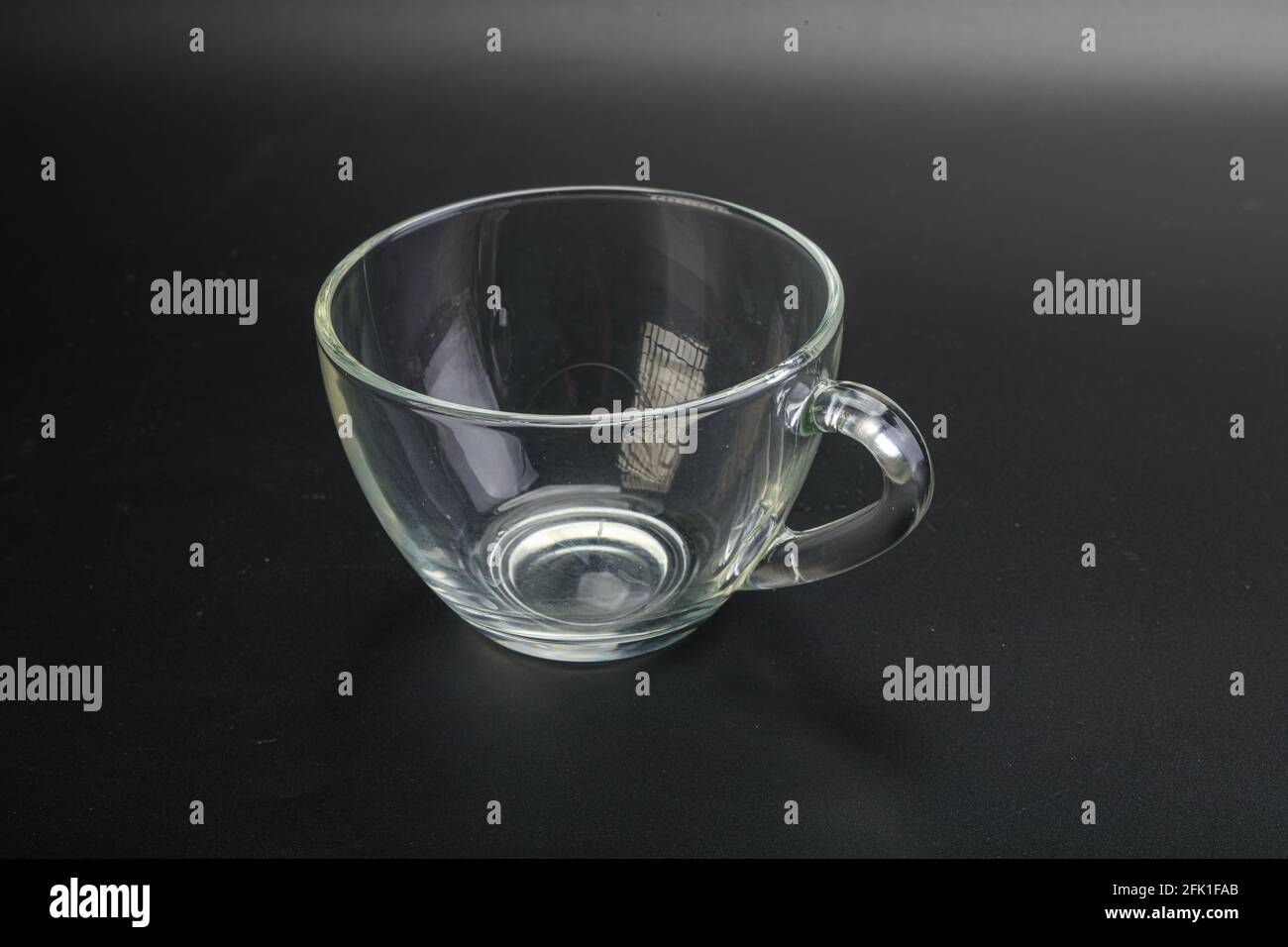 Empty glass cup for drinks isolated Stock Photo - Alamy