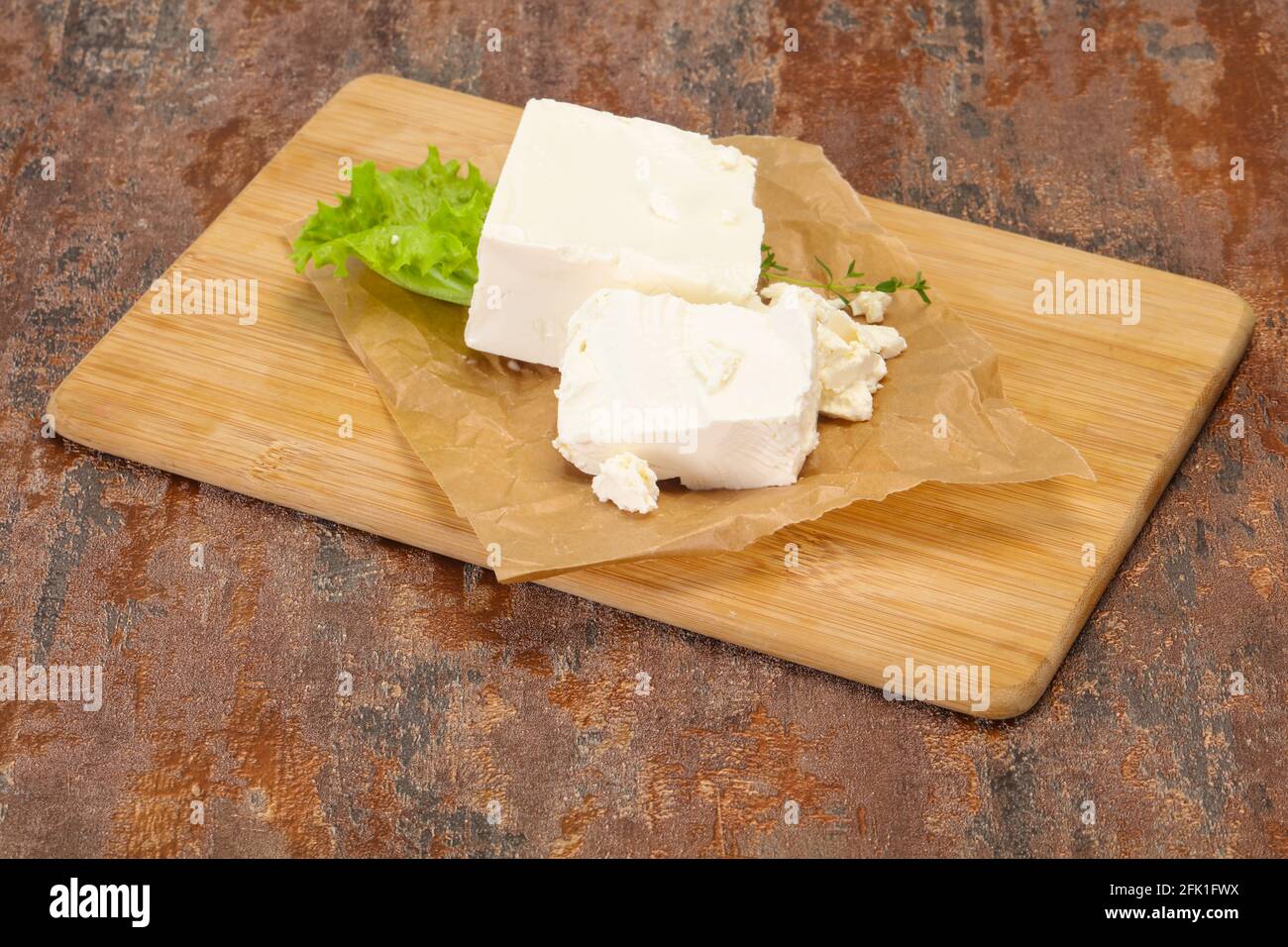 Greek traditional Feta soft cheese in the plate Stock Photo - Alamy