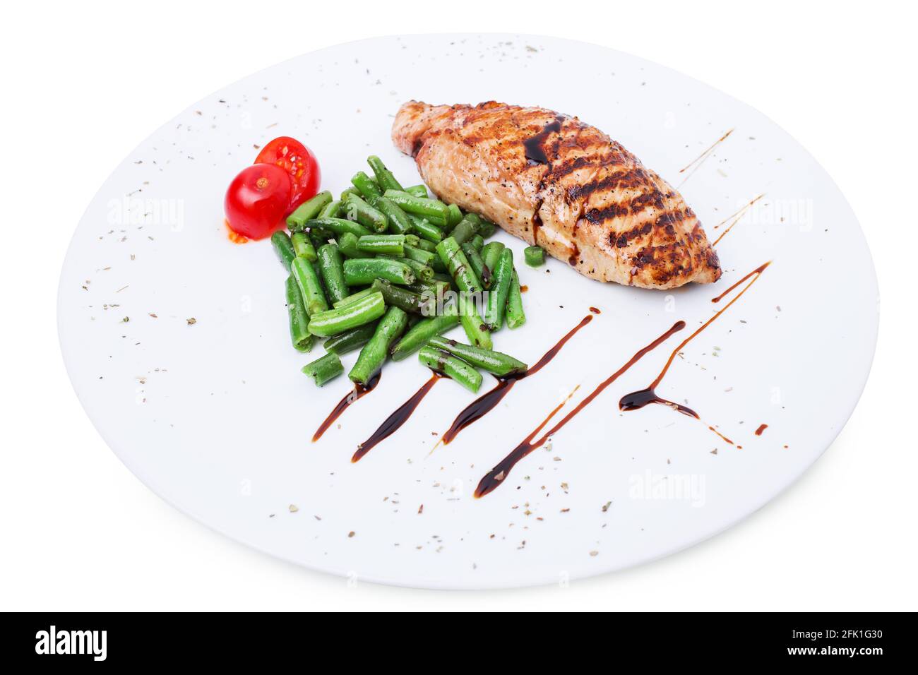 Delicious fried pork fillet with french beans and tomatoes cherry ...