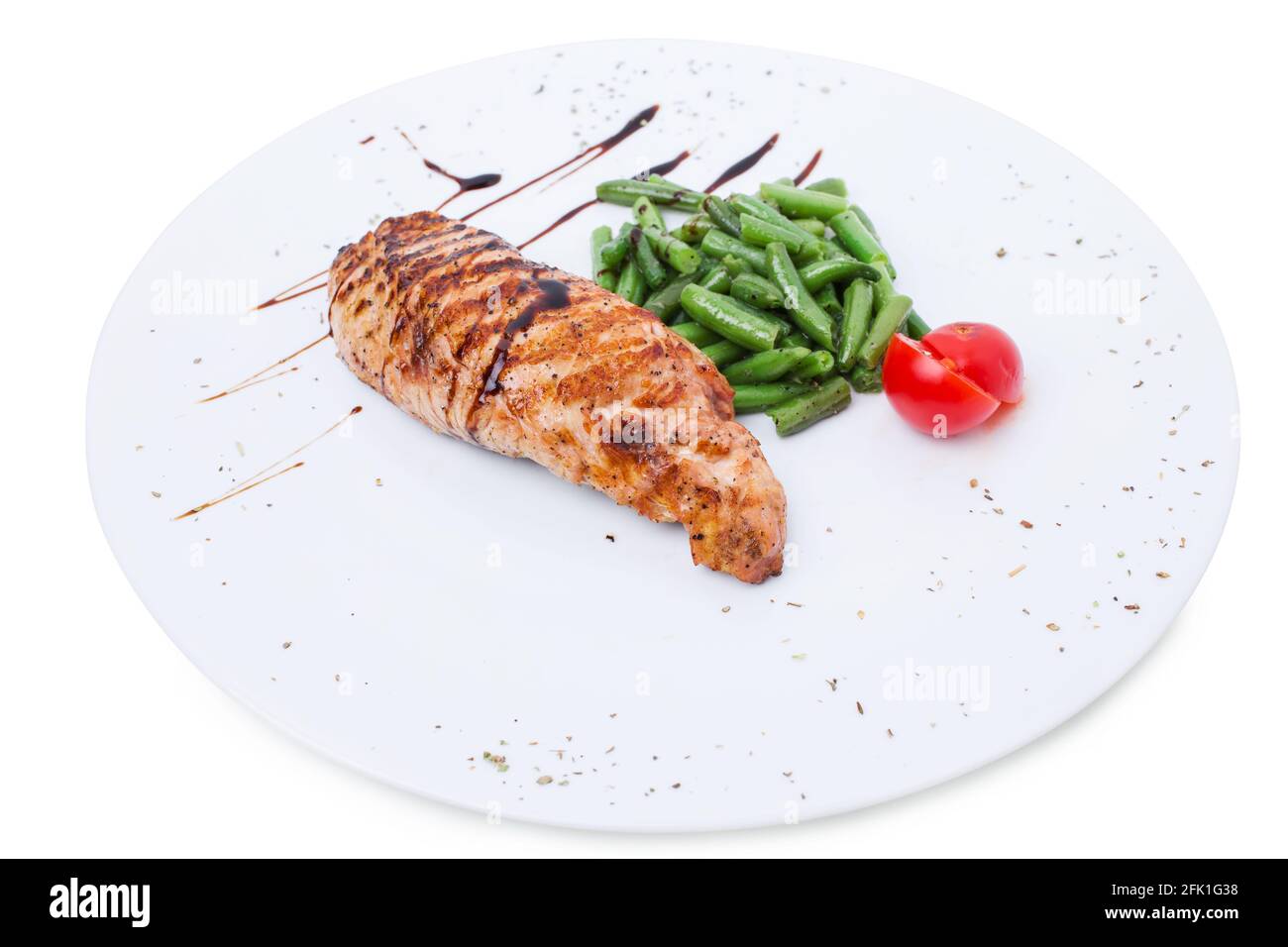 Delicious fried pork fillet with french beans and tomatoes cherry ...