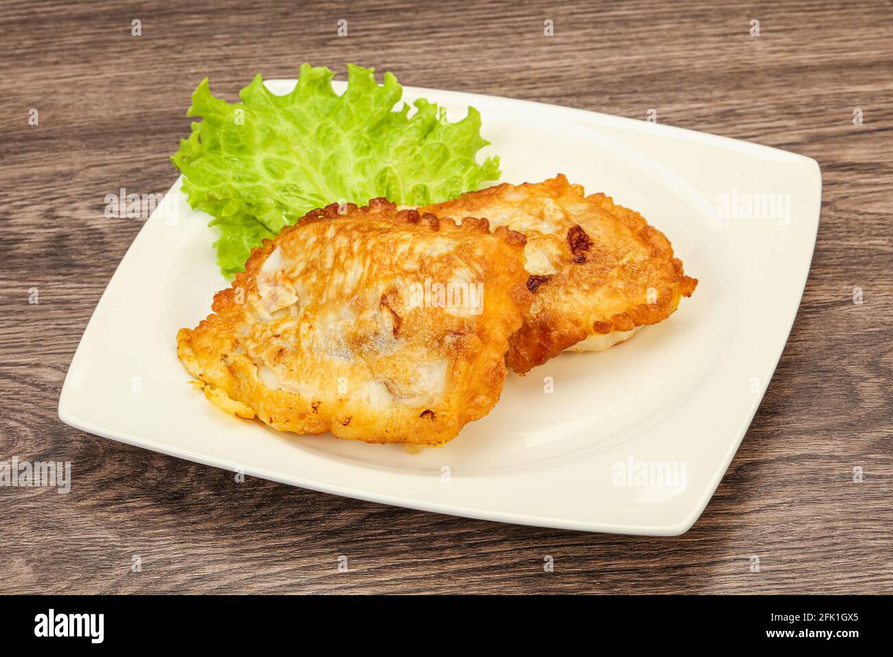 Roasted cod fish in the bread Stock Photo - Alamy