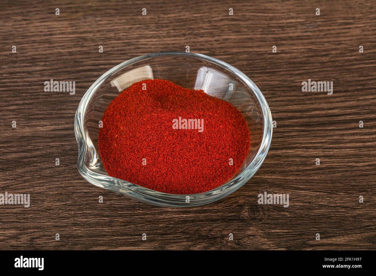 Dry paprika powder in the bowl for cooking Stock Photo - Alamy