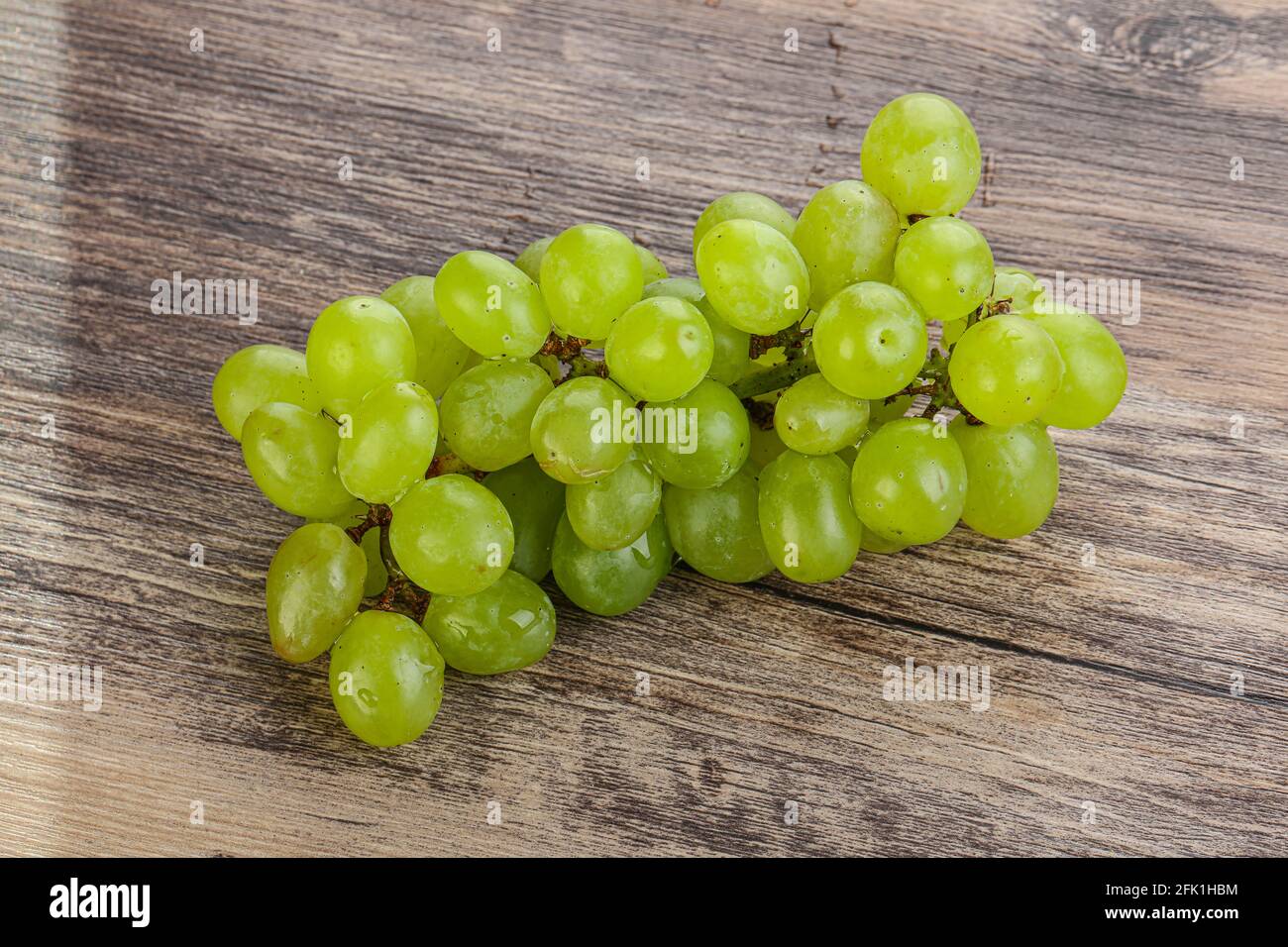 Ripe sweet green grape branch isolated Stock Photo - Alamy