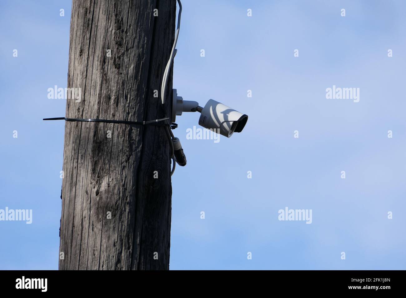 Outdoor security camera on a pole in the open air Stock Photo - Alamy