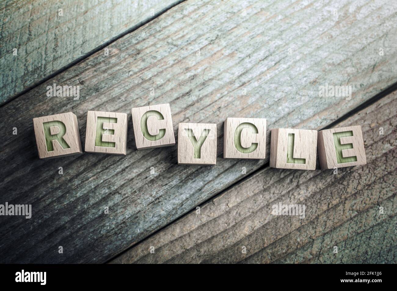 Recycling Written On Wooden Blocks On A Board Stock Photo - Alamy