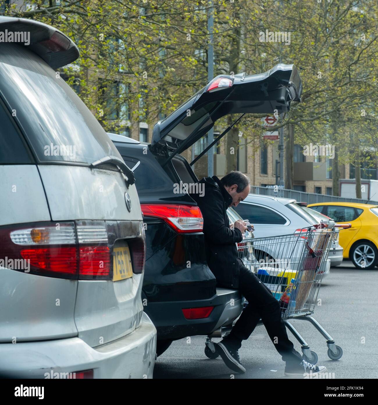Sitting in trolley hi-res stock photography and images - Alamy