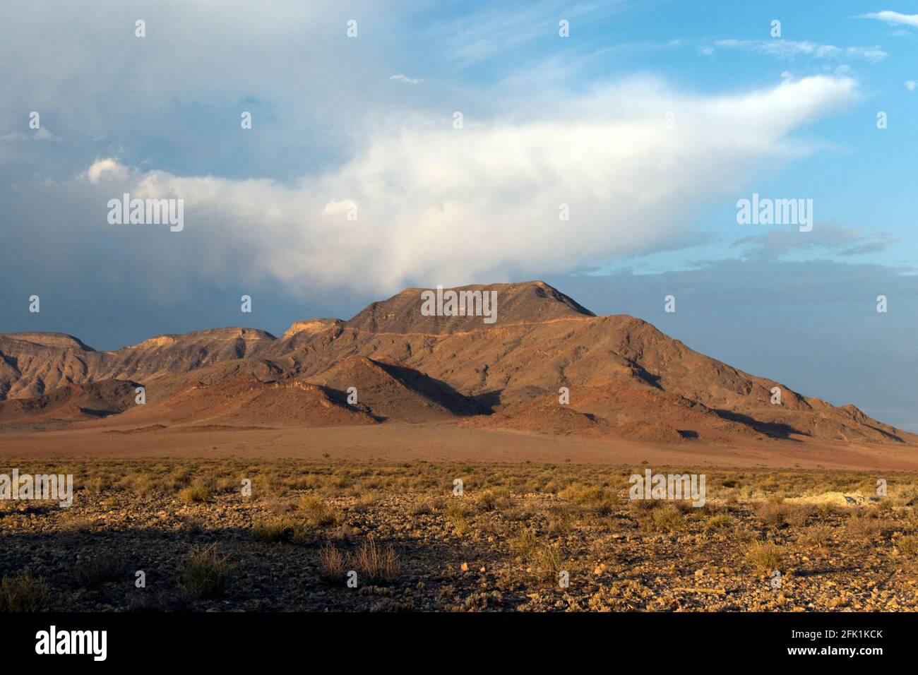 The rugged mountain desert landscape near the famous red sand dunes at ...