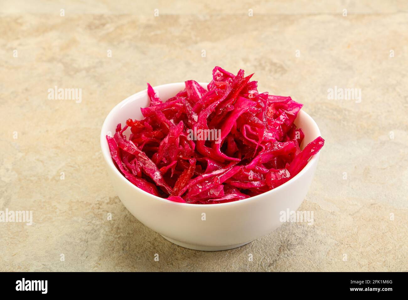 Marinated red cabbage with beetroot in the bowl Stock Photo - Alamy