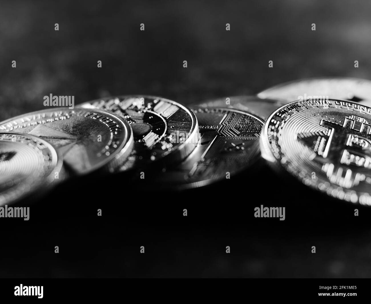 Grayscale shot of coins - the concept of cryptocurrency Stock Photo - Alamy