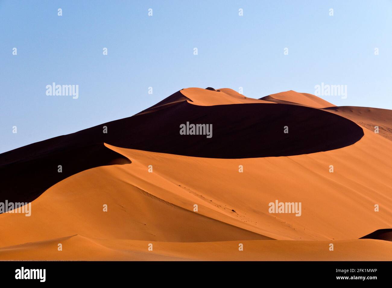 The famous red sand dunes at Sossusvlei, inside the Namib-Naukluft Park ...
