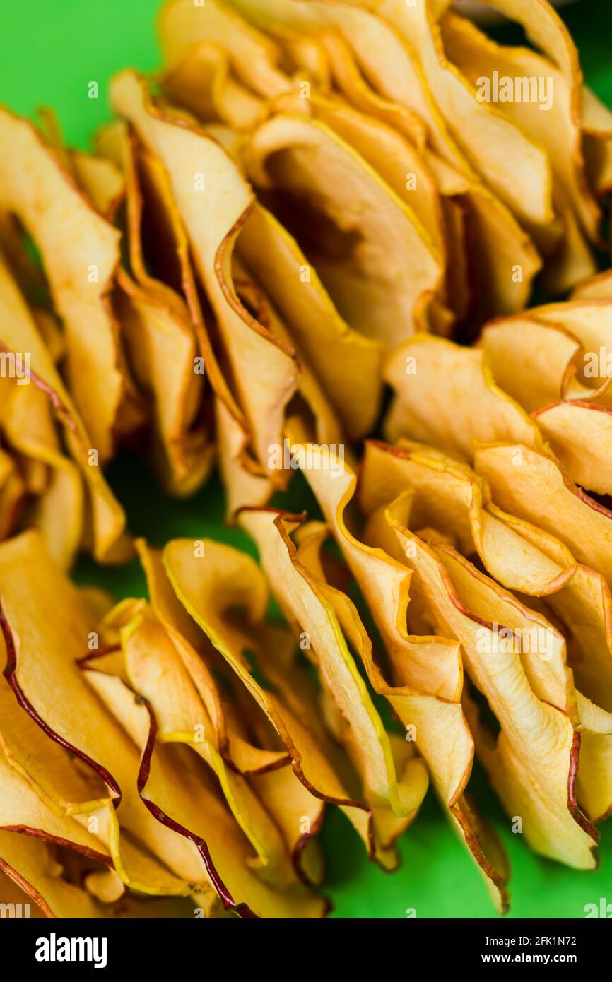 Texture of round dried slices of apple on the green Stock Photo - Alamy