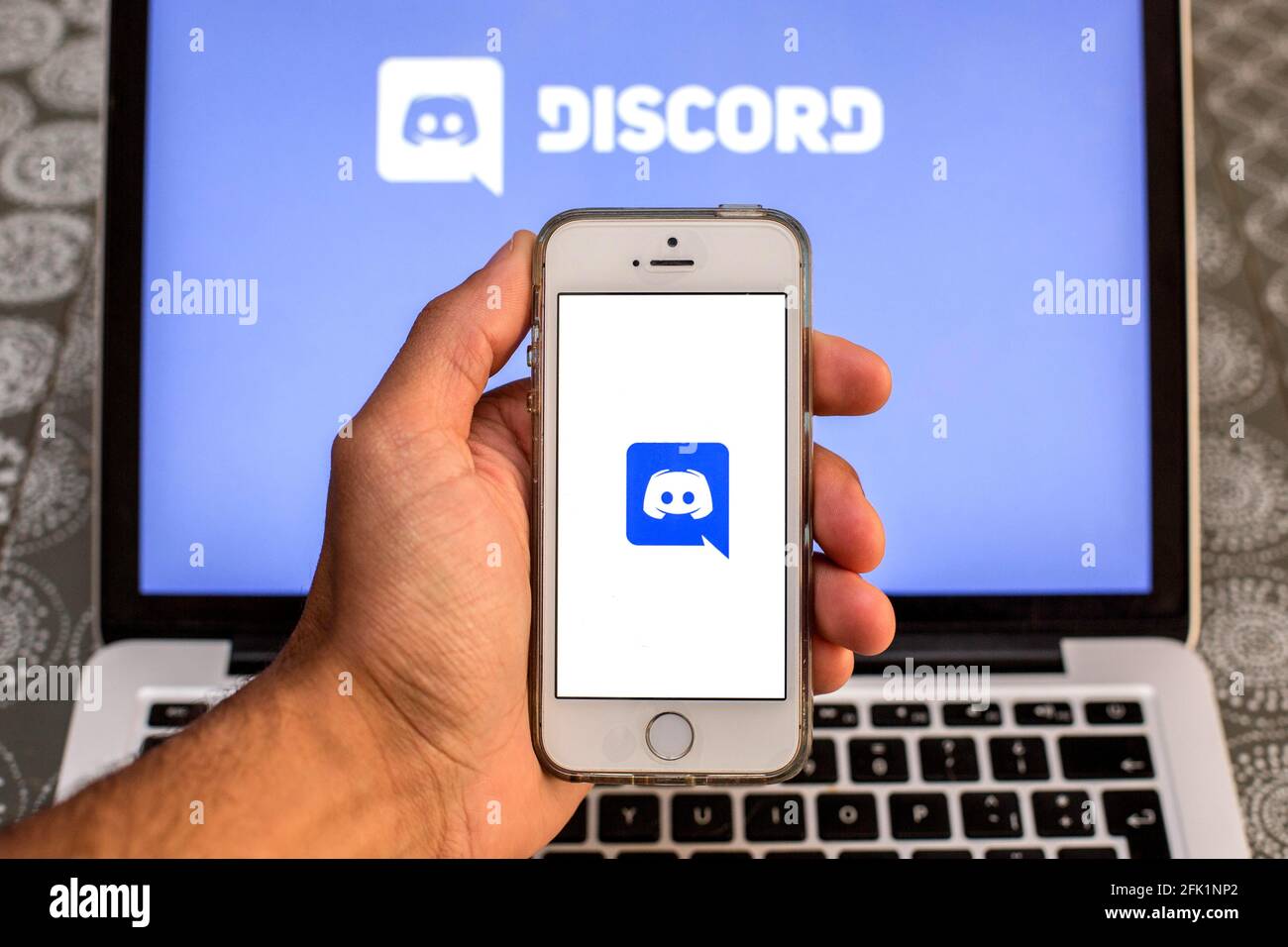 In this photo illustration a Discord app seen displayed on a smartphone ...