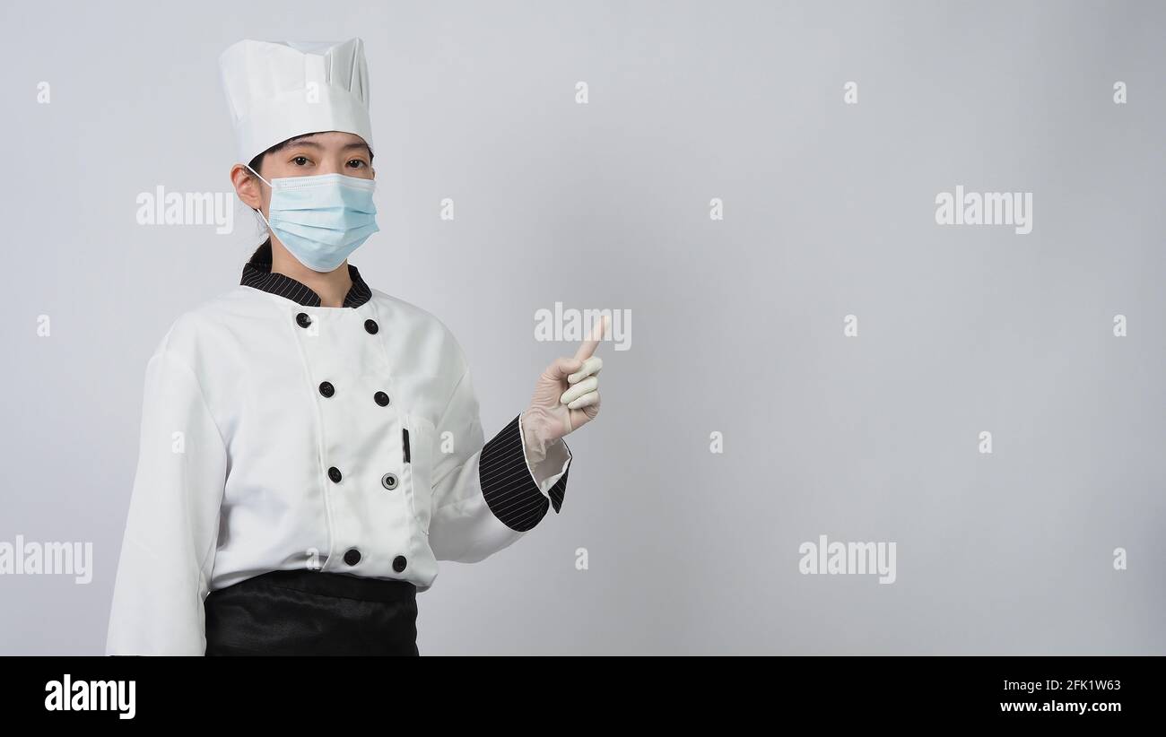 Asian woman chef protective mask hi-res stock photography and images ...