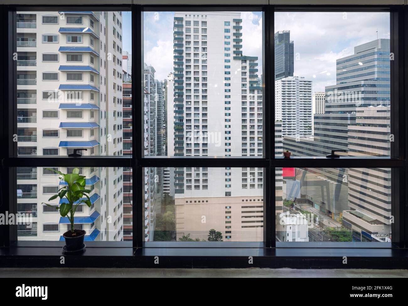 Interior of window office and crowded building in downtown at business ...