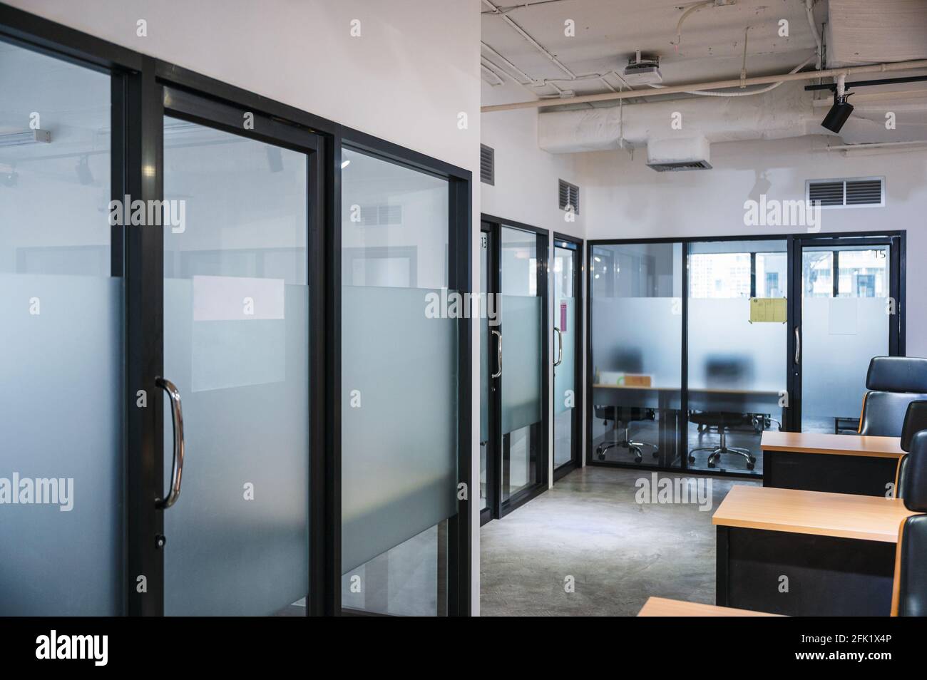 Interior of bankrupt empty modern office coworking space temporarily ...