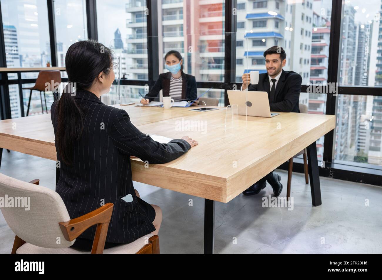 Job interview of caucasian human resource employer with secretary and ...