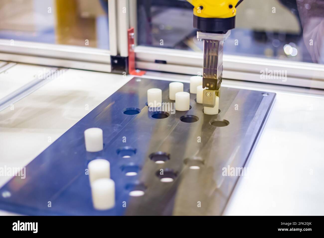 Automated robotic clamp arm, robot hand during work at exhibition ...