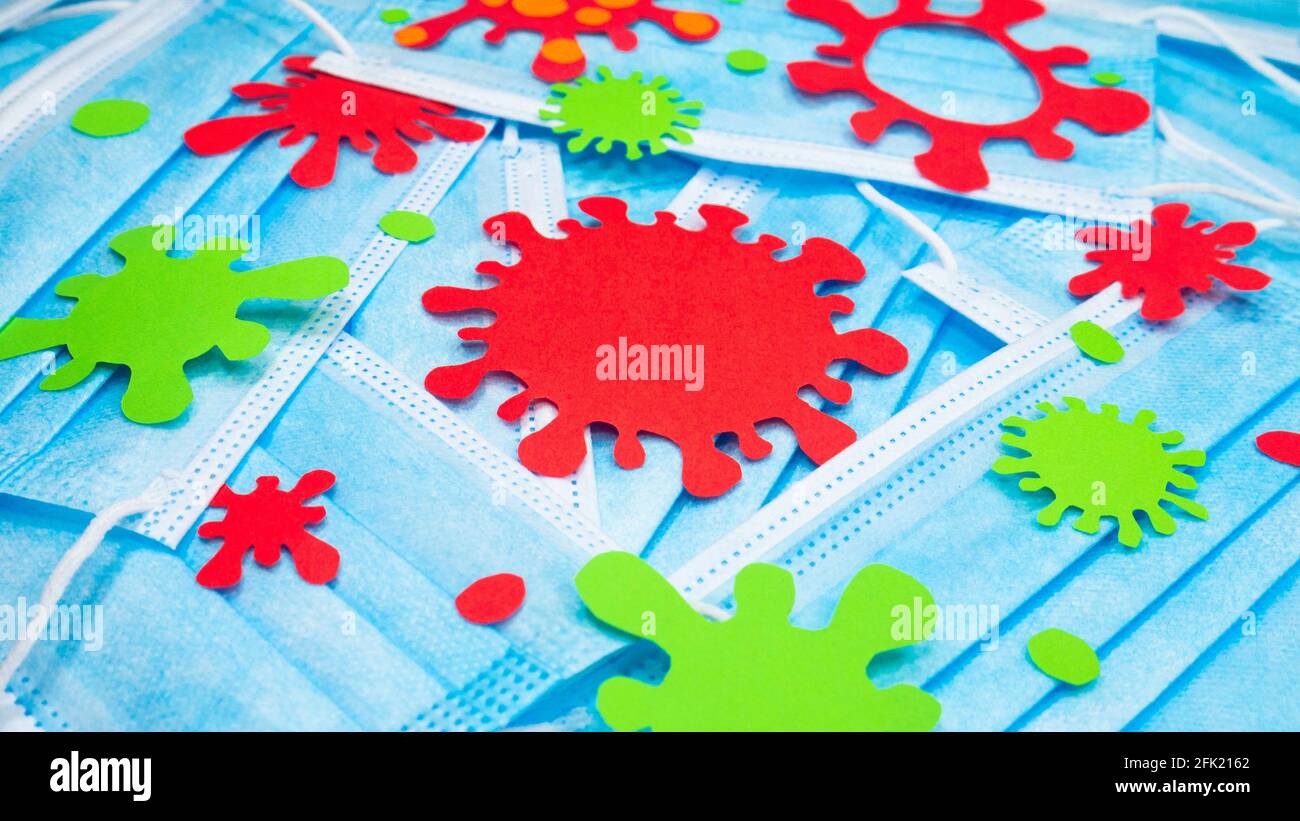 Various viruses and virus types on a medical masks. Bacteria and ...