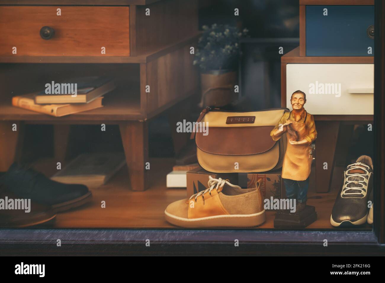 Vintage look of shop window with leather accessories and artisan ...