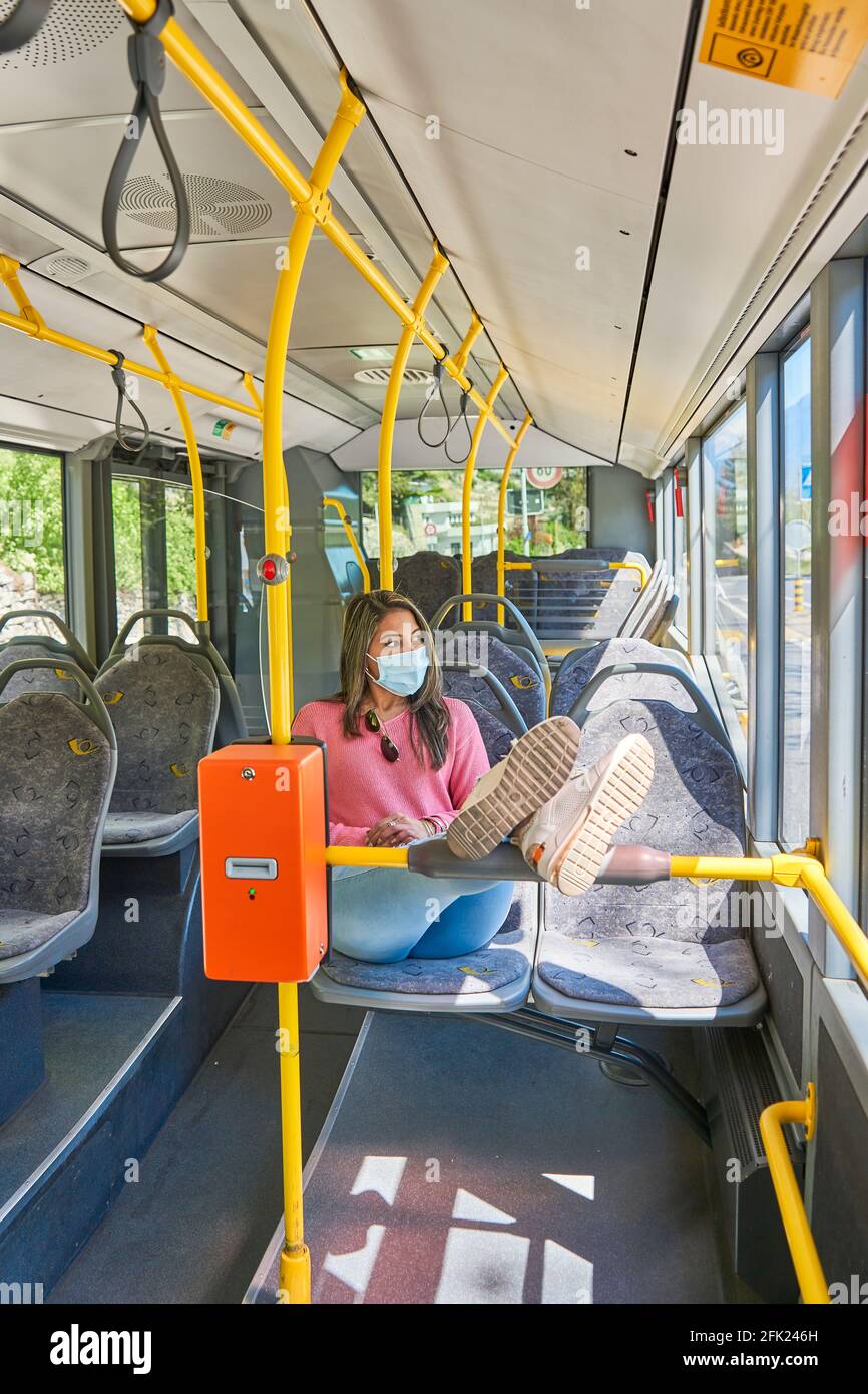 pictures of a different moments of woman traveling in city bus Stock ...