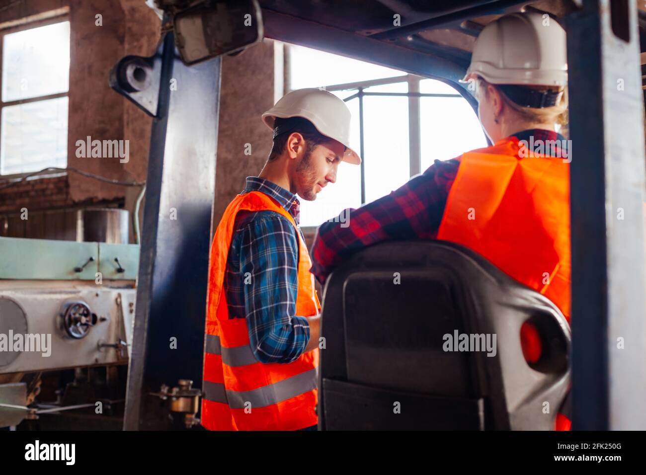 Forklift truck driver co worker hi-res stock photography and images - Alamy