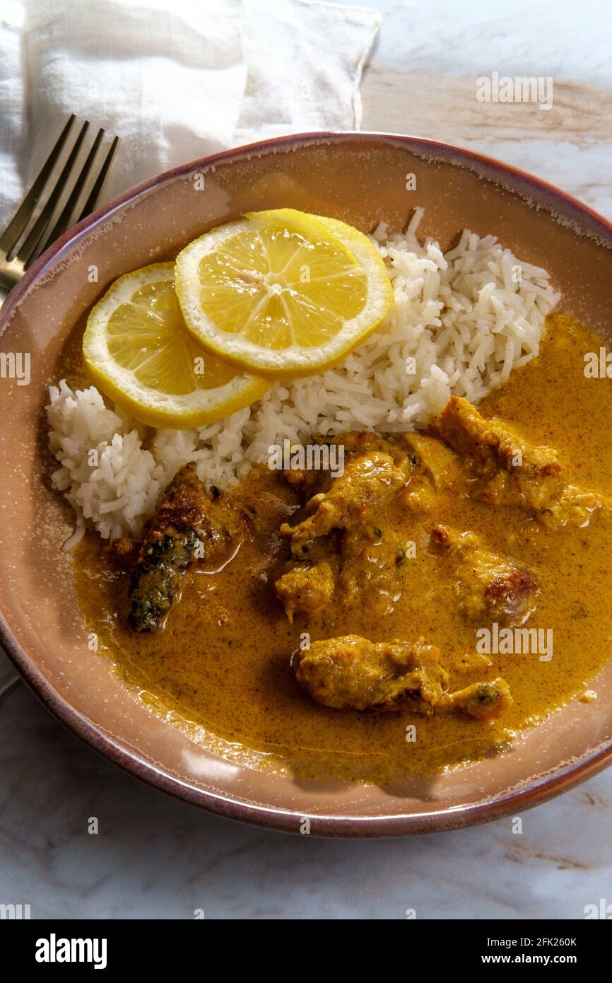 African chicken curry also known as kuku paka, served with rice and ...