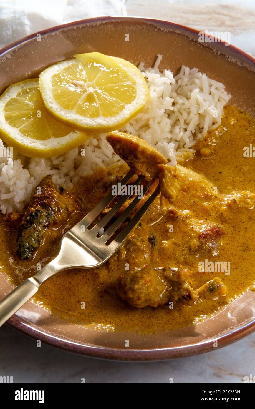 African chicken curry also known as kuku paka, served with rice and ...