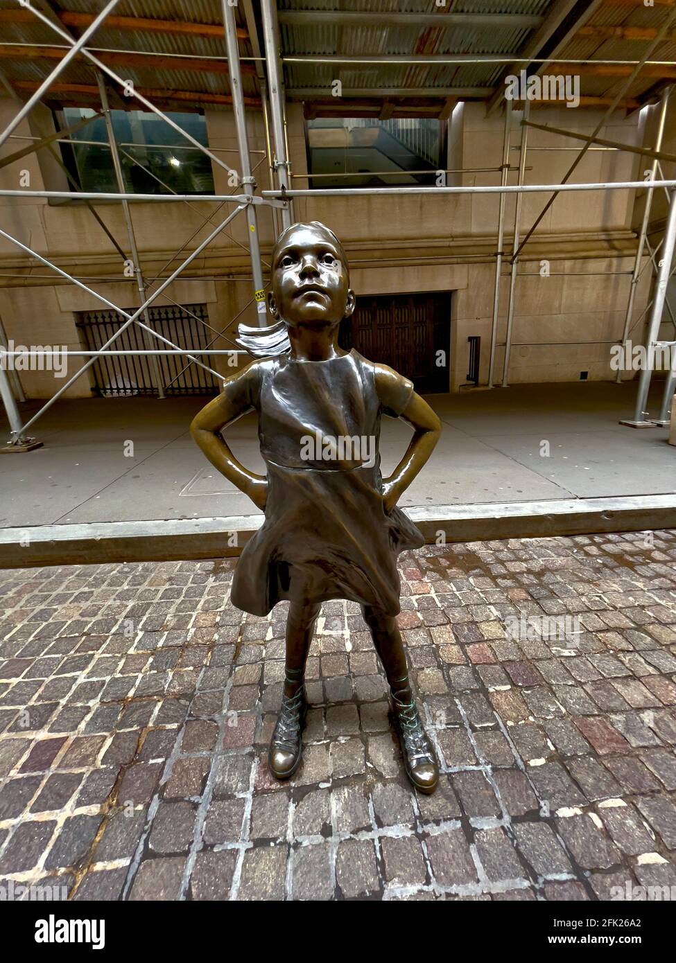 Fearless Girl bronze statue by Kristen Visbal in the financial district ...