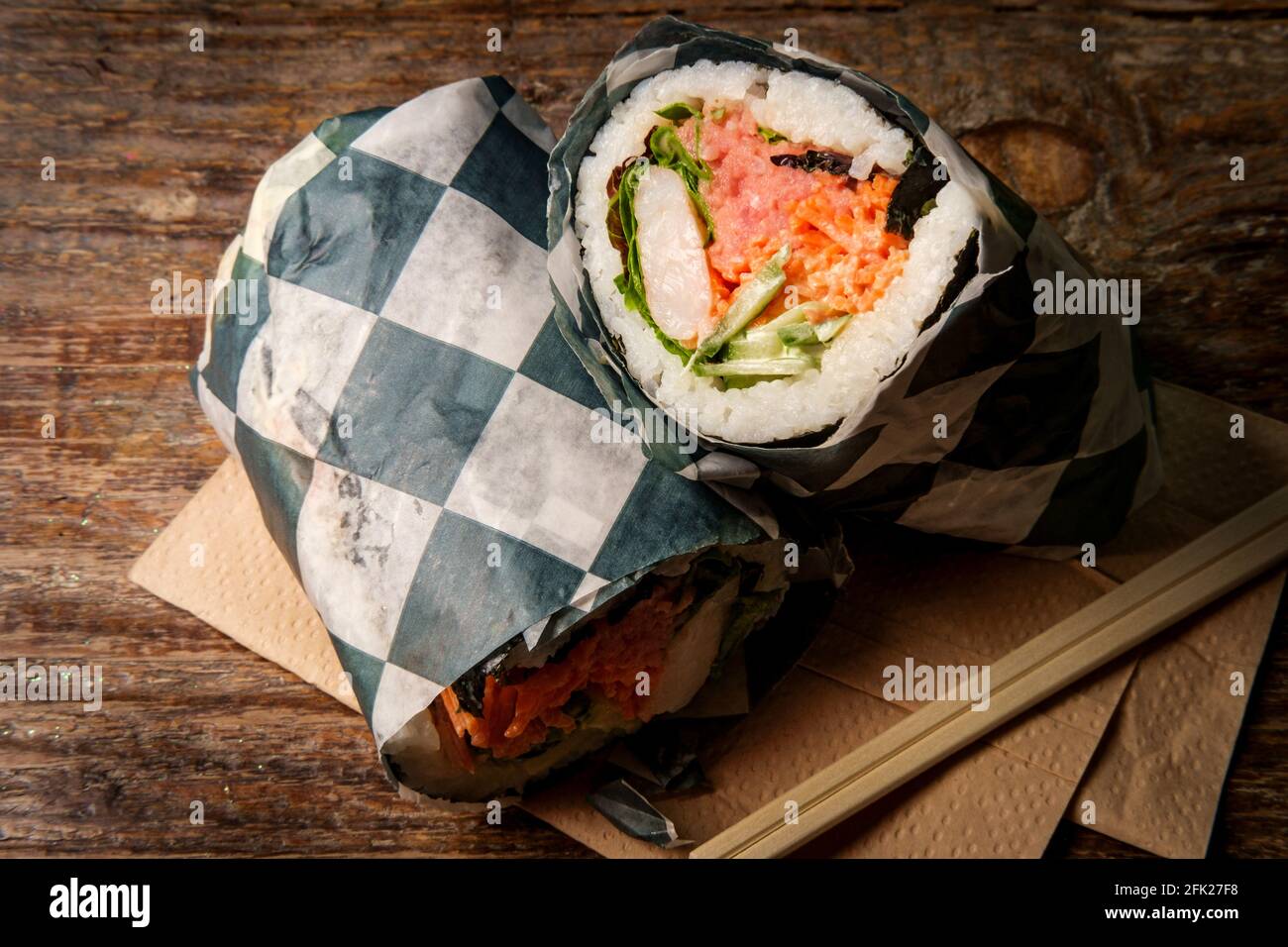 Japanese-American cuisine fusion sushi burrito with spicy tuna and ...