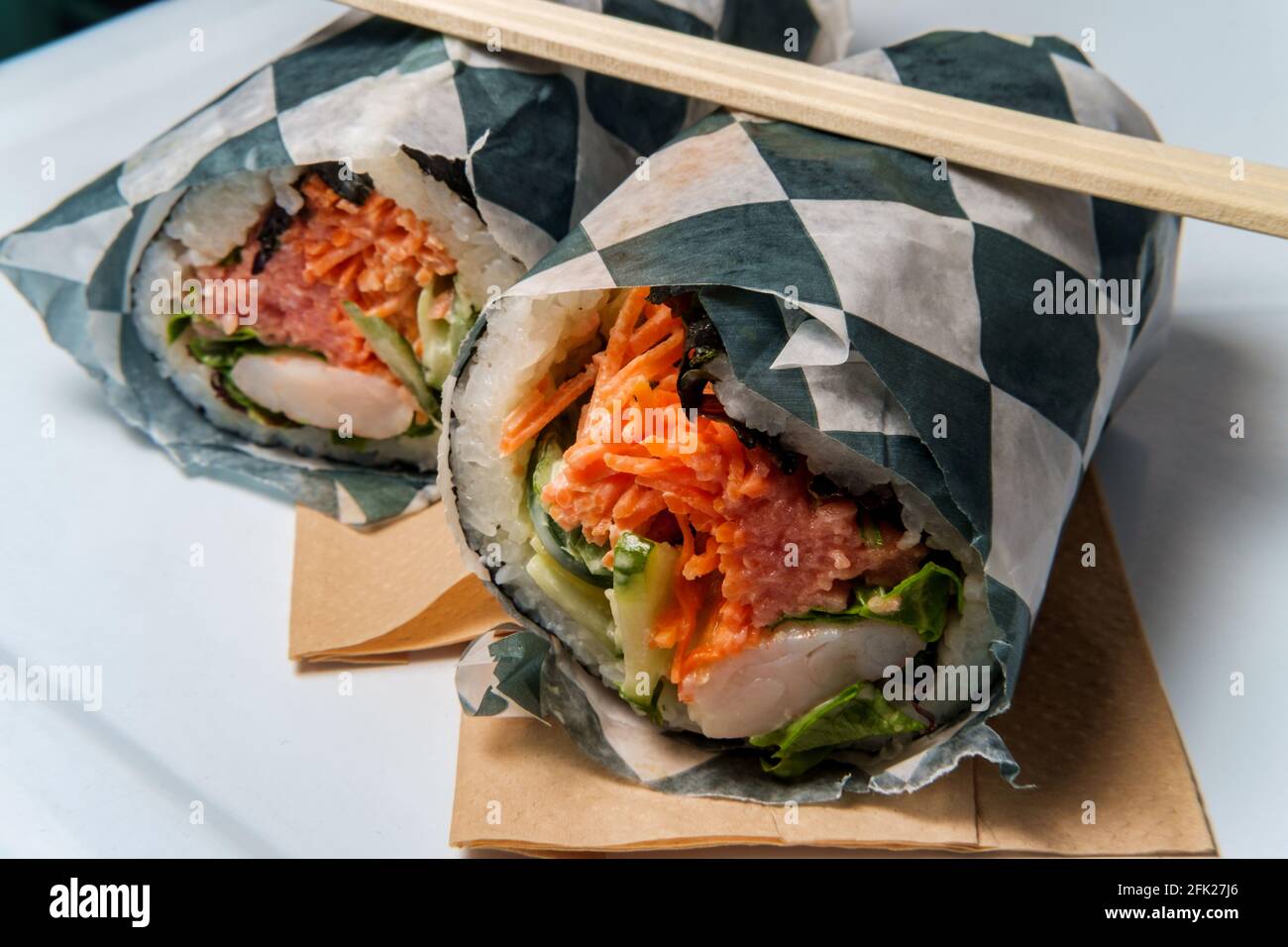 Japanese-American cuisine fusion sushi burrito with spicy tuna and ...