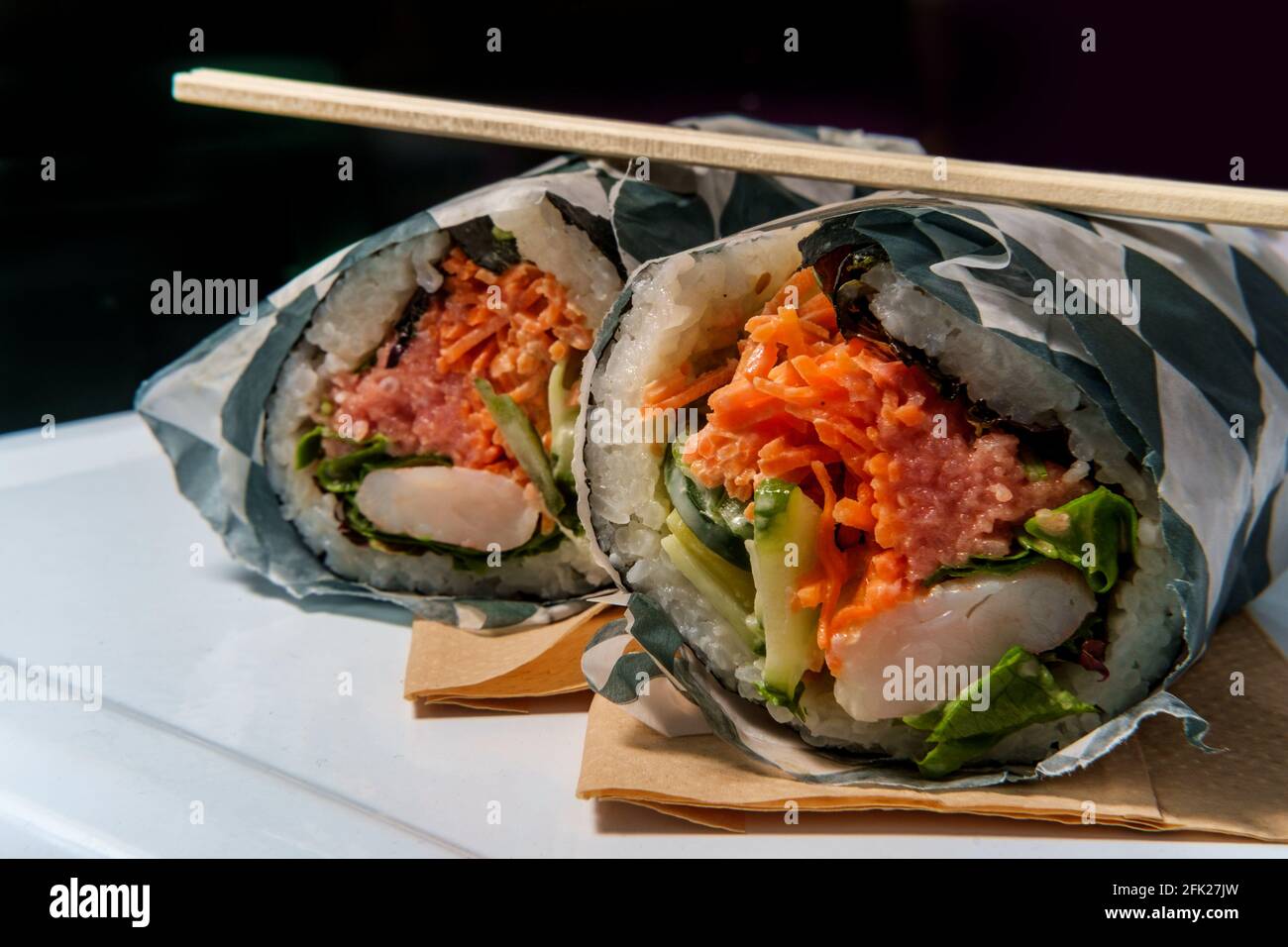 Japanese-American cuisine fusion sushi burrito with spicy tuna and ...