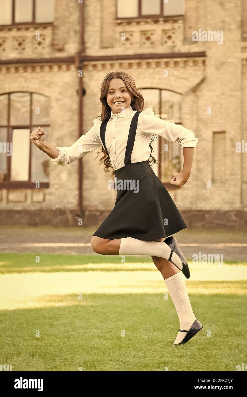 small student girl run towards knowledge. back to school. little girl ...