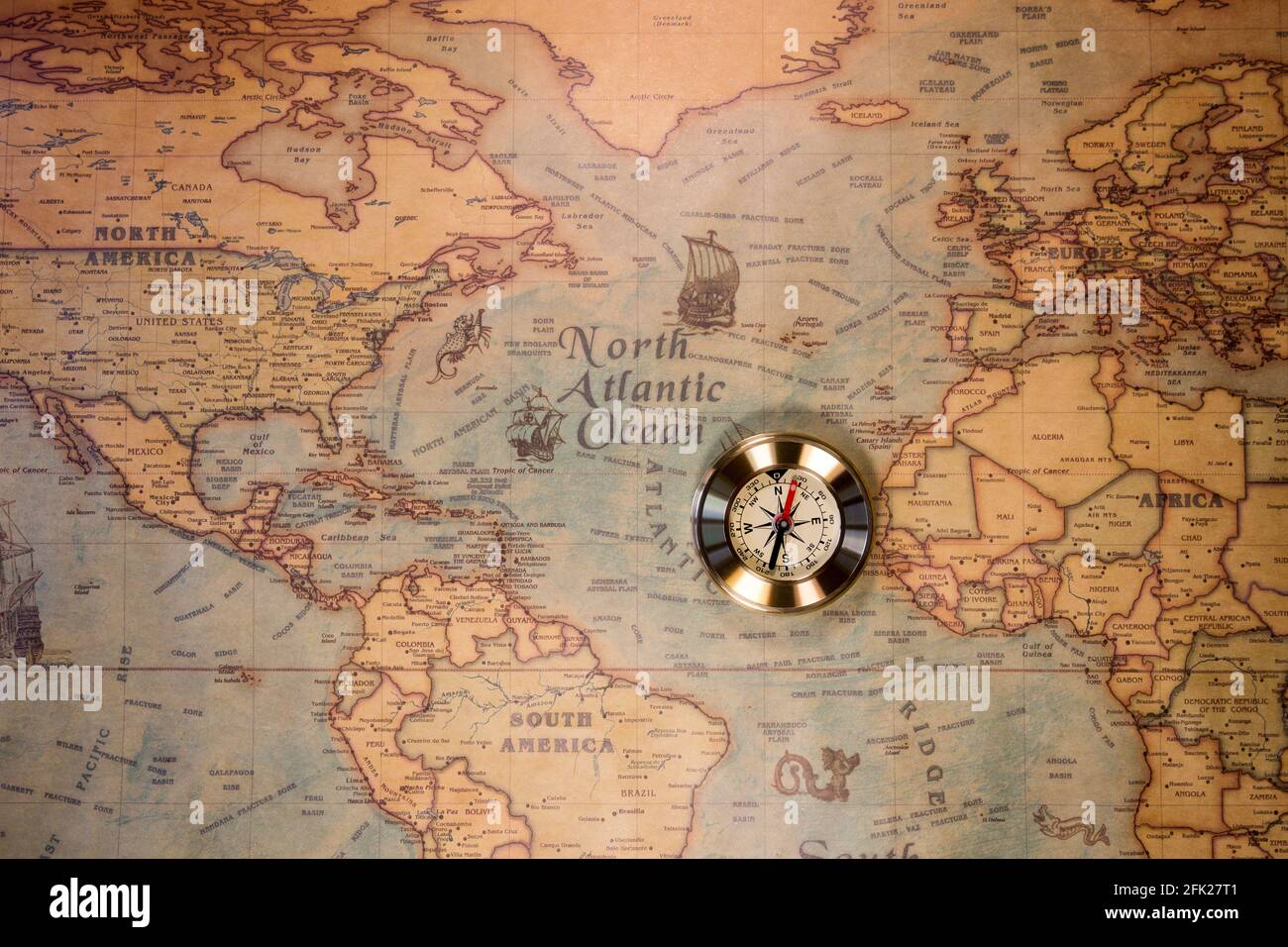 Golden Compass and the Map. Travel and Navigation Theme. Map used for ...
