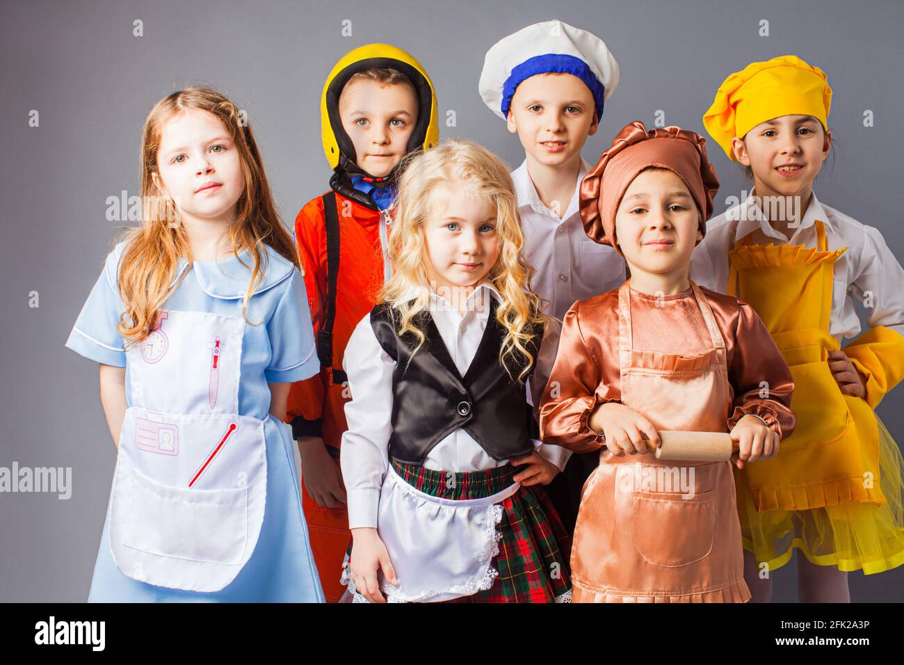 The group of kids in costumes of different professions Stock Photo - Alamy