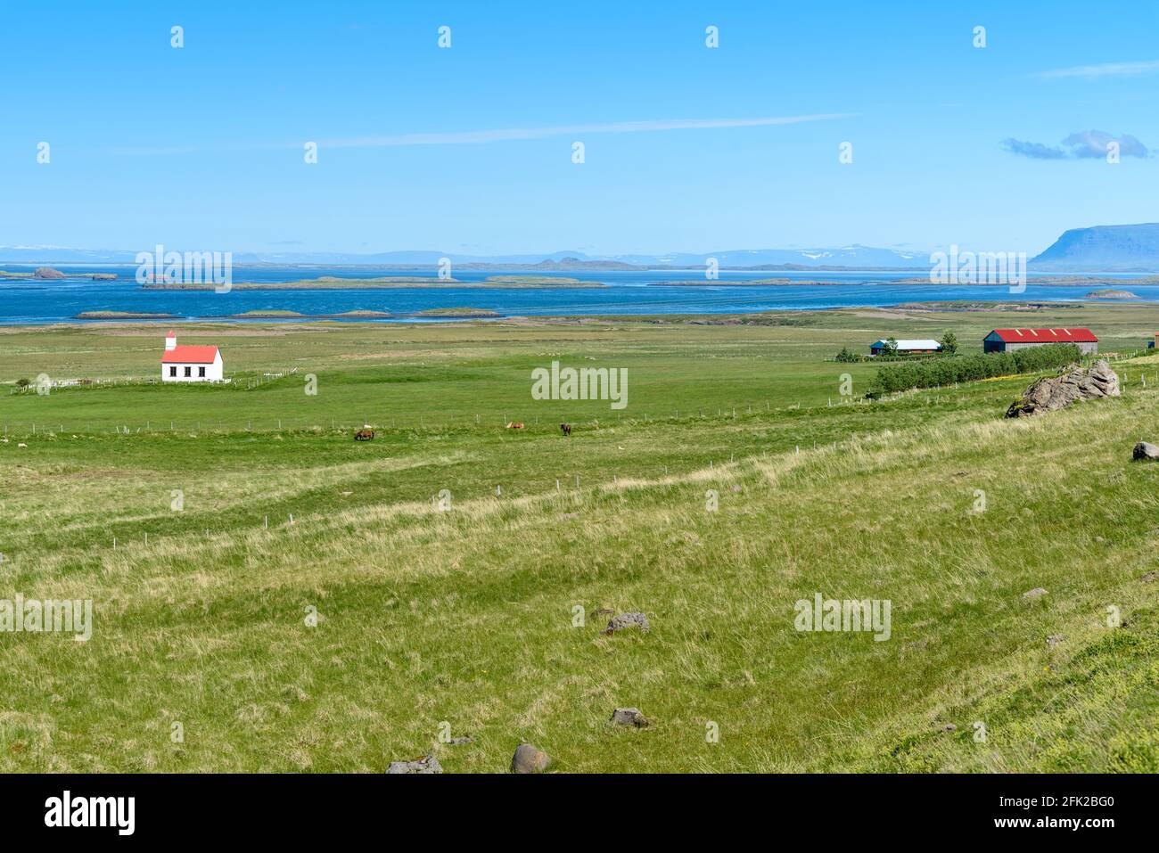 Remote farm along a rugged coast on a clear summer day Stock Photo - Alamy