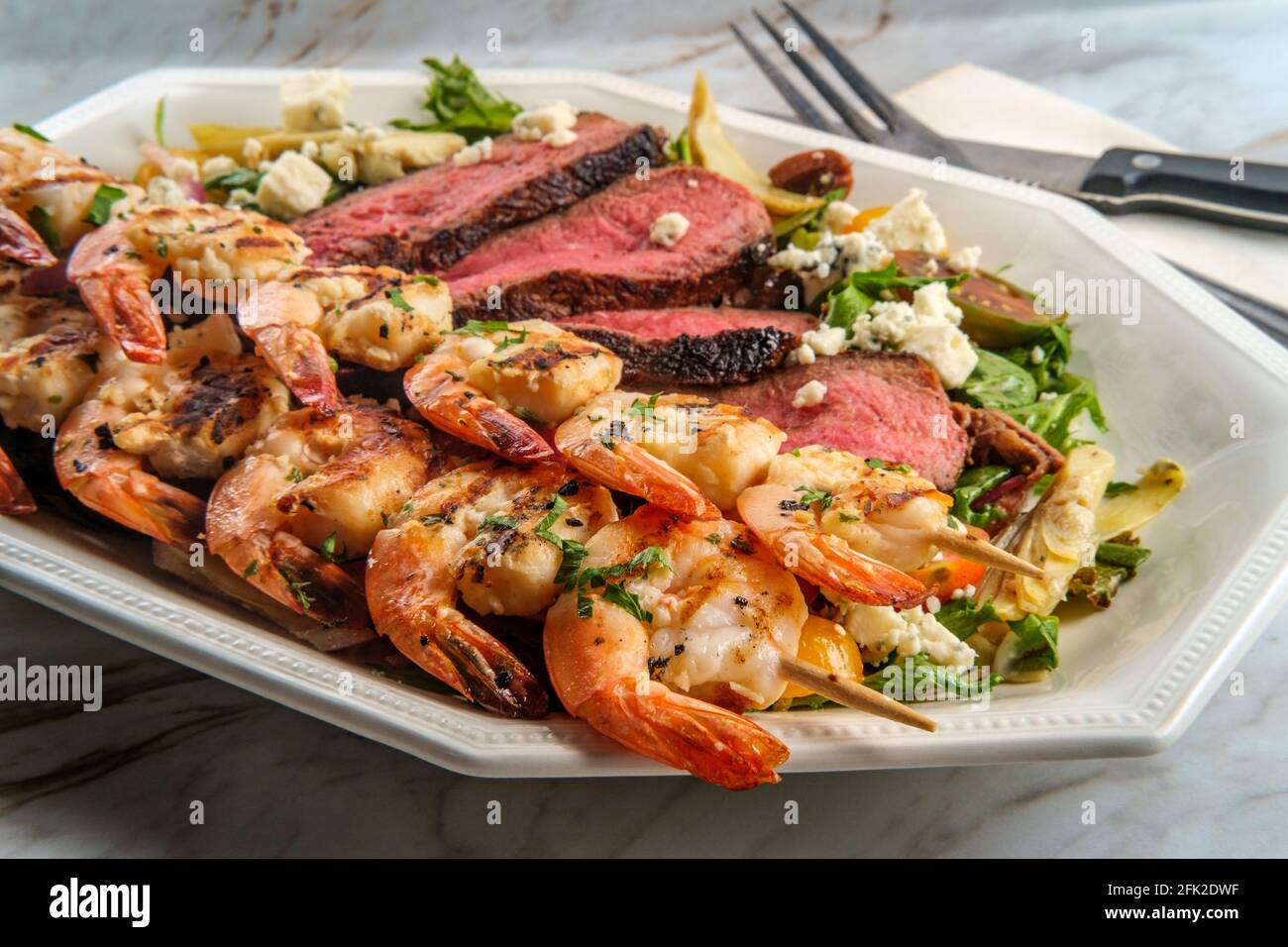 Blue cheese surf and turf shrimp and steak salad cooked rare with ...