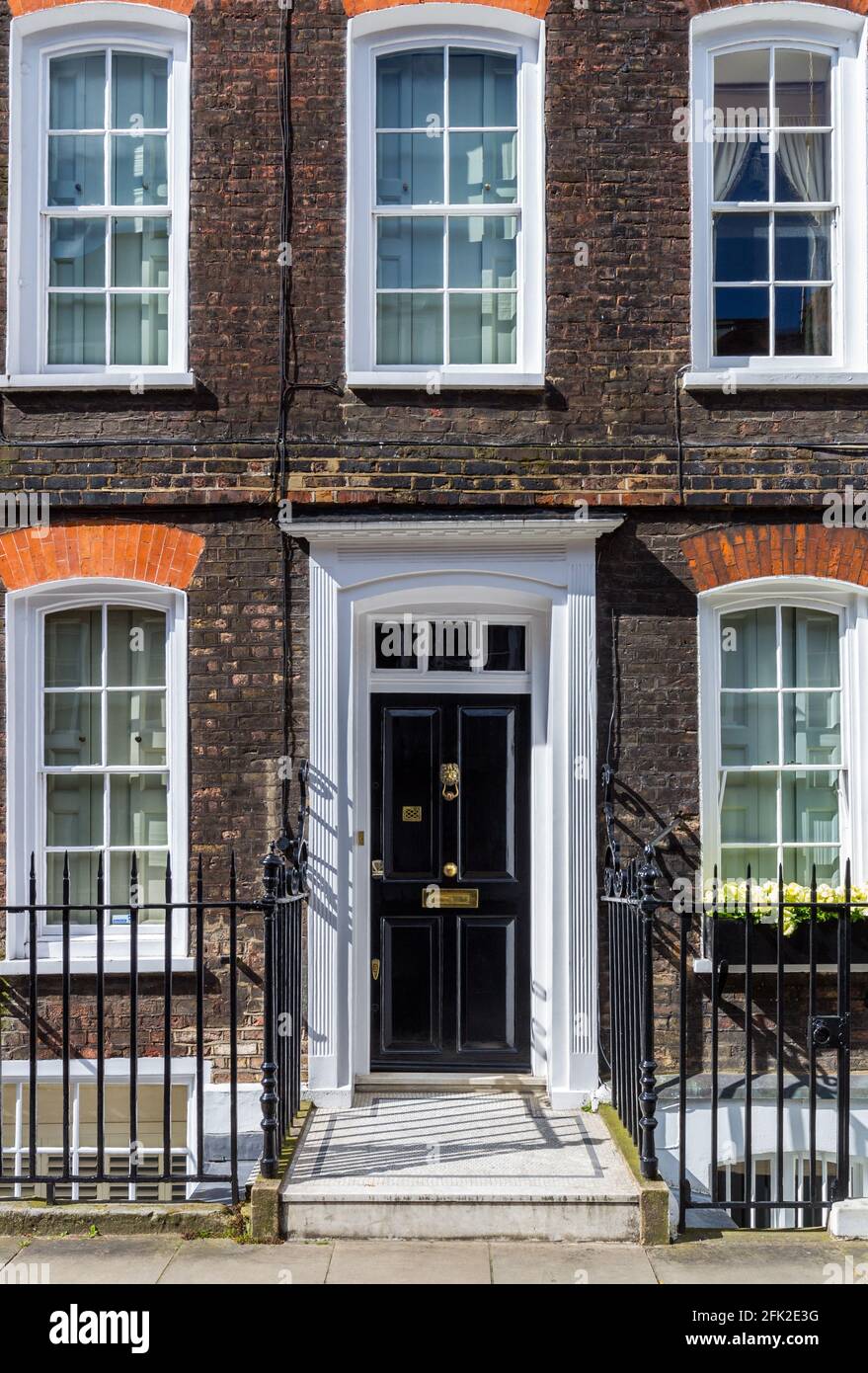 Typical street scene in the central London district with familiar ...